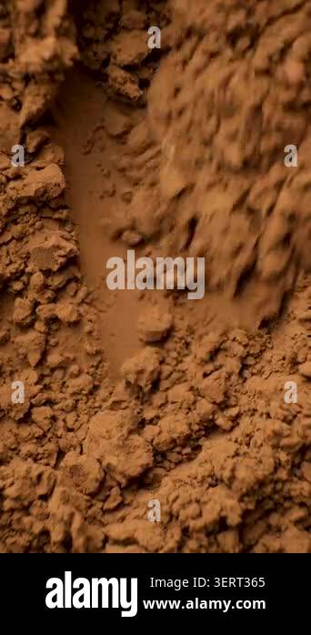 Spoon stirring dry cocoa powder macro top view Stock Video Footage - Alamy