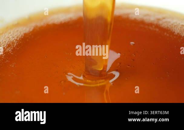 Natural maple syrup flow, slow motion Stock Video Footage - Alamy