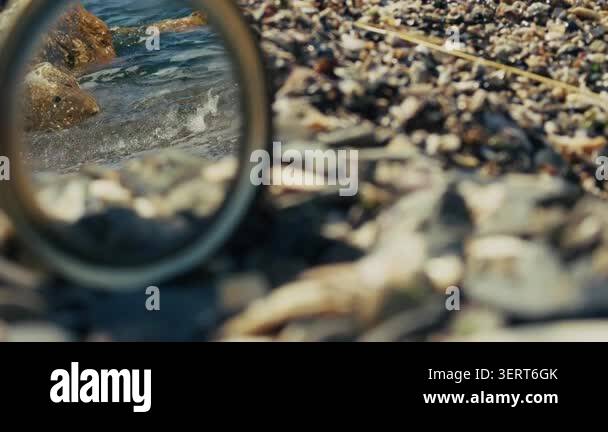 Sea Waves Reflected in a Mirror on Pebbles on the Beach Holiday Concept ...