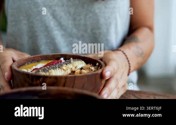 Healthy Woman Eating Smoothie Bowl with Fresh Fruits and Berries. Close ...