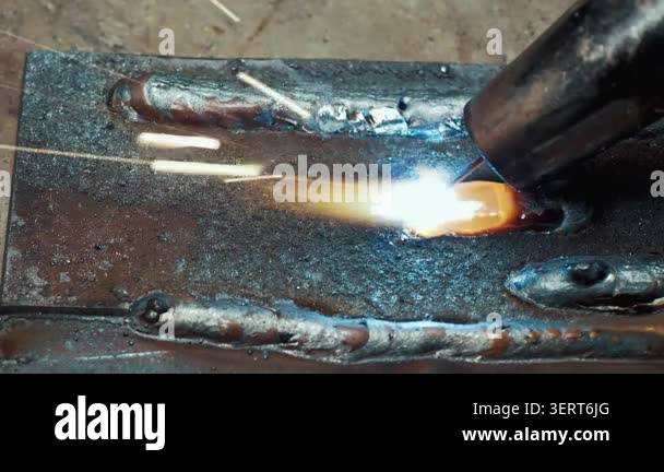 Extreme Close-up View of Industrial Welding Bead Production on Steel ...