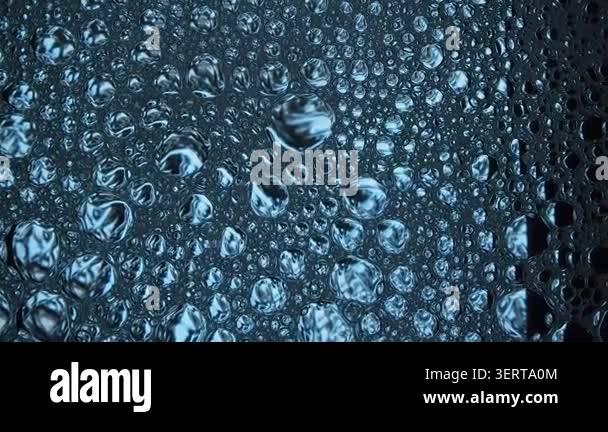 Blue water bubbles forming an intricate abstract pattern with ...