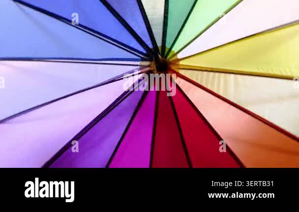 rainbow spectrum multicolored background of an umbrella Stock Video ...