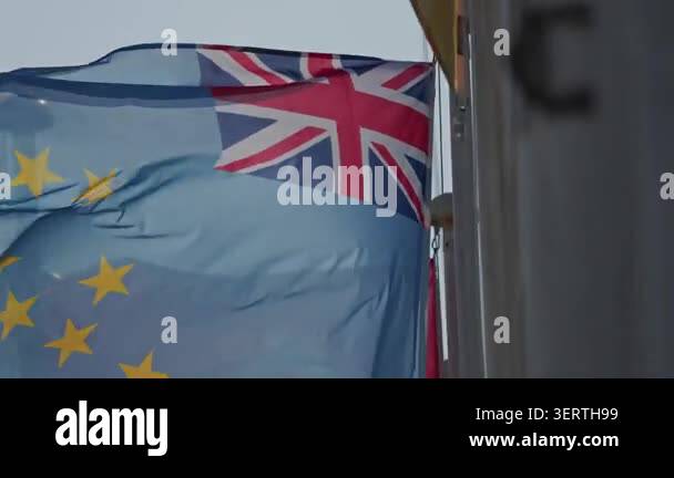 Flag of tuvalu waving in the wind with other international flags on a ...