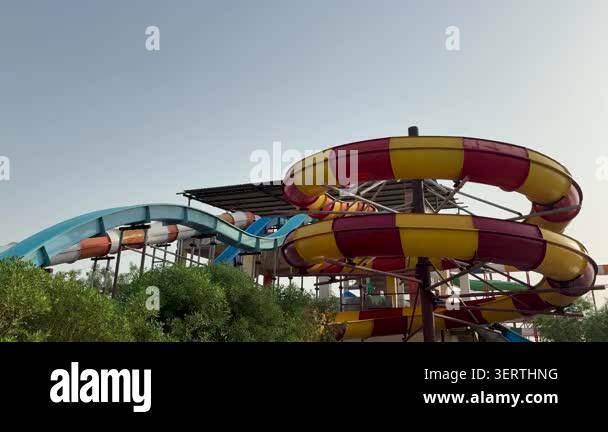 water park attraction with winding tube slides under clear sky Stock ...