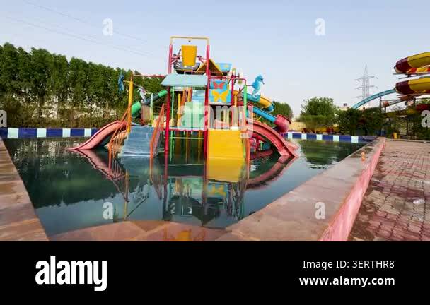 children's water recreation facility with vibrant slides and splash ...