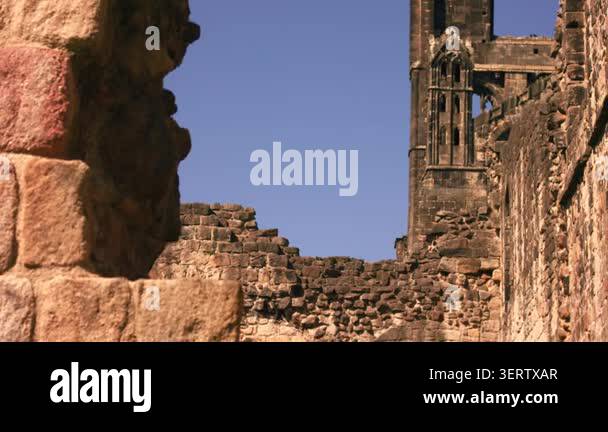 Kirkstall Abbey Church ruins in Leeds Yorkshire medium tilting zoom ...