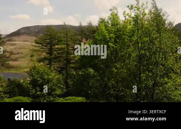 Saddleworth moors rocks and hill England wide aerial drone zoom shot ...