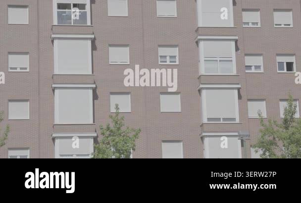Close view of a modern residential apartment building facade featuring ...
