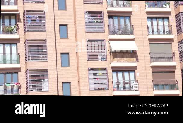 Close view of a modern residential apartment building facade featuring ...