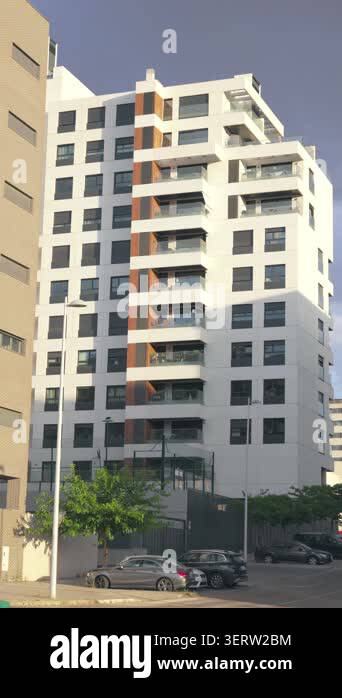 Vertical view of a modern residential apartment building with balconies ...