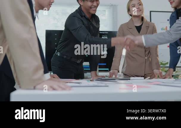 Business people shaking hands during meeting together in office Stock ...