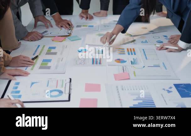 Business people hands analyzing charts and graphs on table Stock Video ...
