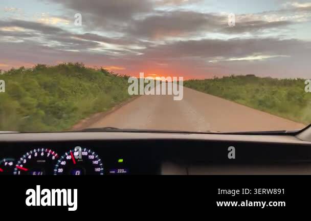POV driving shot in Thyolo, Southern Malawi, at sunset with a car ...