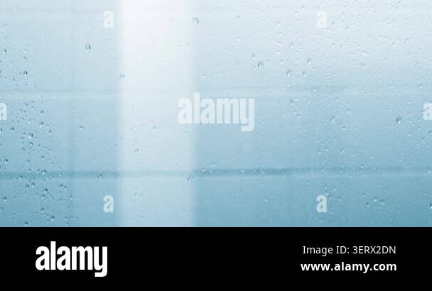 Water droplets on shower glass creating a soft wet texture. Water ...