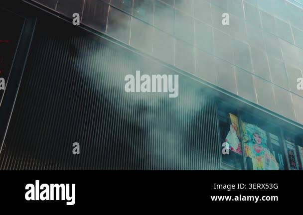 HONG KONG, CHINA - MAY 19 2025: Steam raises up from ventilation system ...