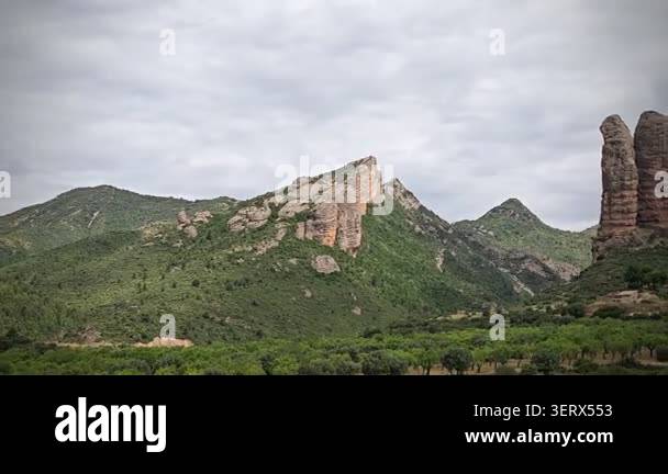 Aguero village in Spain is surrounded by the impressive rock formations ...