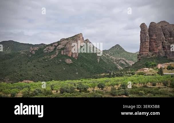 Aguero village in Spain is surrounded by the impressive rock formations ...