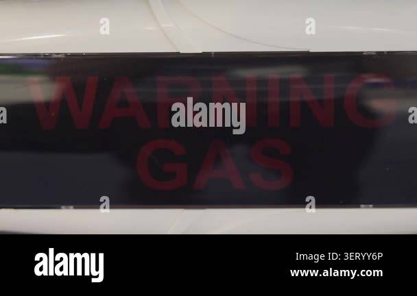 Flashing Warning Toxic Gas Caution Signal in Parking Garage Stock Video ...