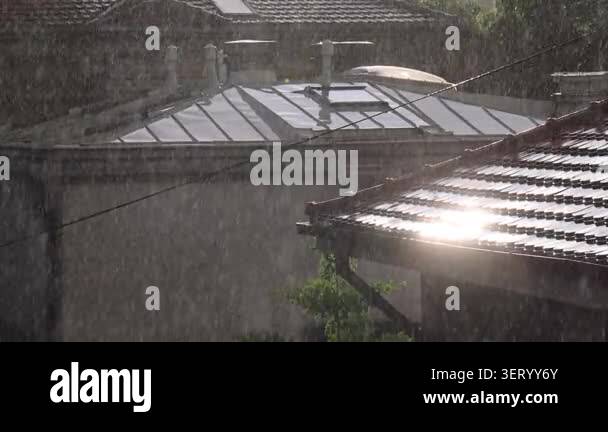 Rain Wet Roof Tiles Sun Reflection at Houses Stock Video Footage - Alamy
