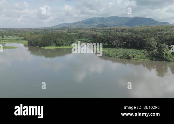 Aerial View of a Modern Dam with Water Channels and Scenic Surroundings ...