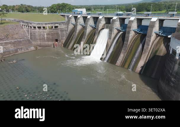 A Stunning Aerial View of a Large Hydro Dam with Majestic Water Flow ...
