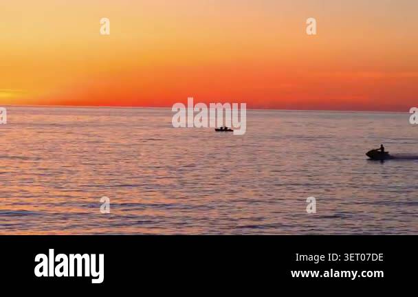sunset over the sea Stock Video Footage - Alamy