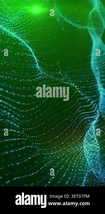 Abstract digital waves formed by glowing particles move across a ...