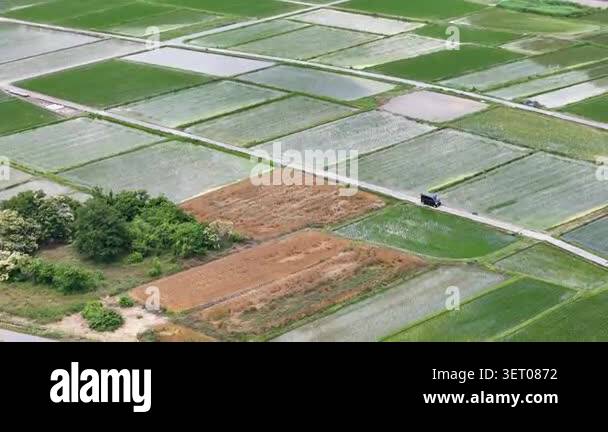 Aerial view of agricultural fields and patches Stock Video Footage - Alamy