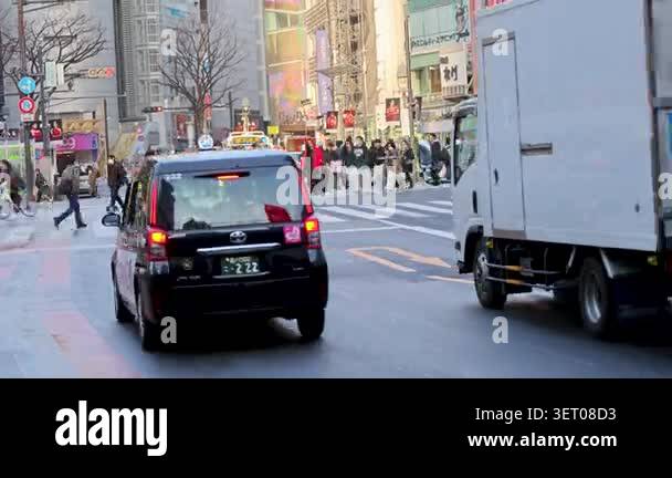 Tokyo Japan February 23, 2026: Cars and Delivery Truck Driving Through ...