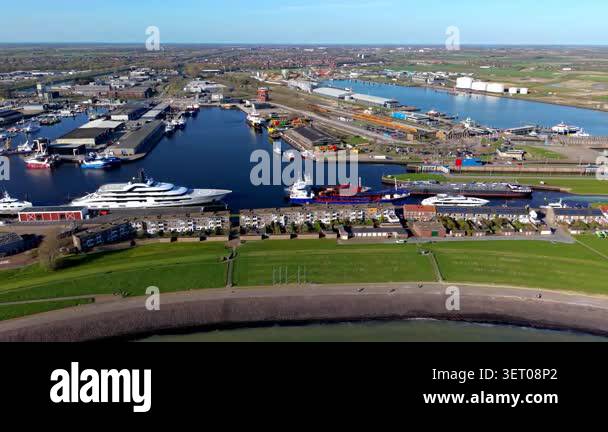 High-angle drone perspective capturing the busy seaport and harbor ...