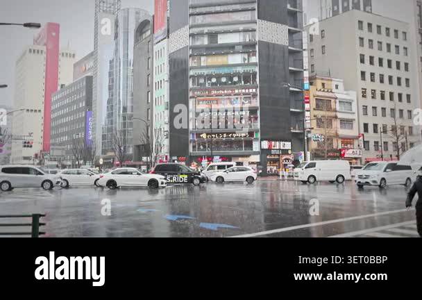 Tokyo Japan February 23, 2026: Cars Driving Through Rainstorm in Busy ...