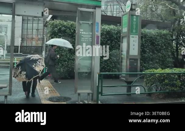 Tokyo Japan February 23, 2026: Rainy Tokyo Bus Stop Pedestrians ...