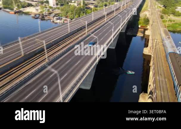 Aerial video of two parallel bridges at the entrance to the city ...