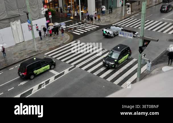Tokyo Japan February 23, 2026: Rainy Tokyo Intersection With ...
