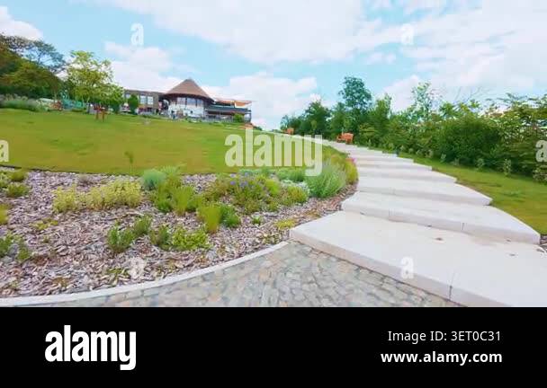 Tihany, Hungary - May 19, 2026: Beautiful landscaped public garden with ...
