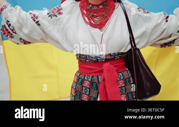 Detailed close-up of a woman wearing a traditional Ukrainian vyshyvanka ...