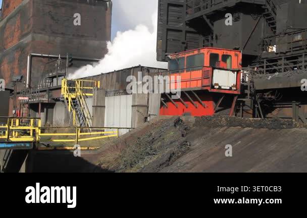 Coke making plant on modern steelworks in action. Coal heated in the ...