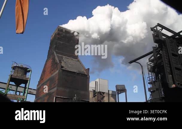 Coke making plant on modern steelworks in action. Coal heated in the ...