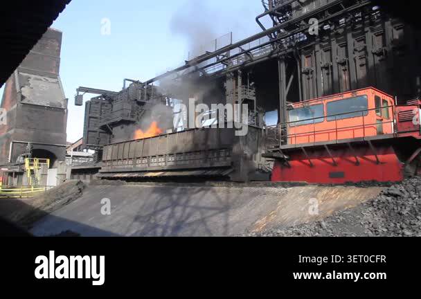 Coke making plant on modern steelworks in action. Coal heated in the ...