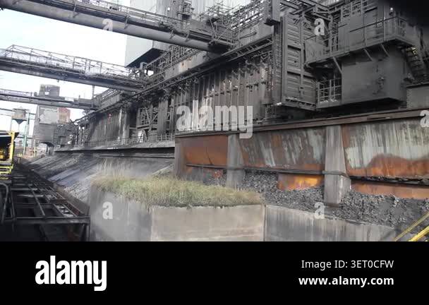 Coke making plant on modern steelworks in action. Coal heated in the ...