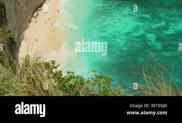 High angle view of people swimming in crystal clear turquoise water at ...