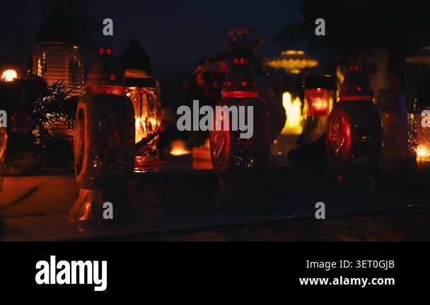 Lamps Lighting Up The Night At The Cemetery Stock Video Footage - Alamy