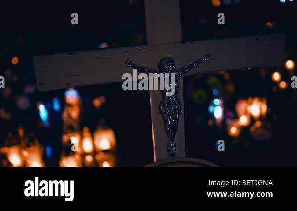 Cross At Cemetery With Many Candles In The Background Stock Video ...
