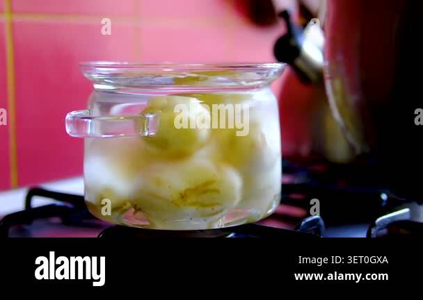 Fresh young potatoes are washed, peeled, boiled and checked for ...