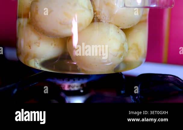 Fresh young potatoes are washed, peeled, boiled and checked for ...