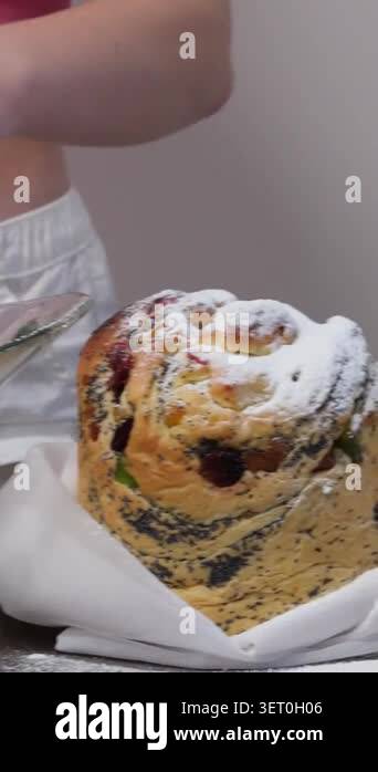 Female hands making soft layered cruffin dough with butter, dried ...