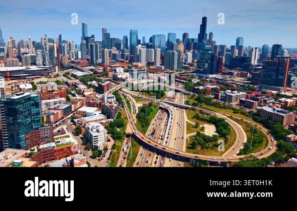 Lively traffic on the roads and roundabouts of downtown at daytime ...