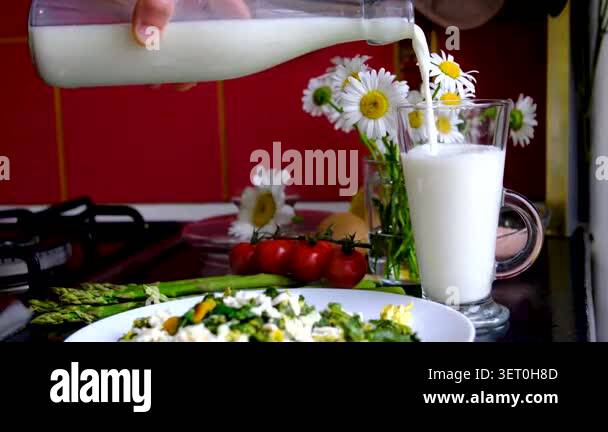 Fresh spinach is cooked with eggs and creamy cheese in a skillet, then ...
