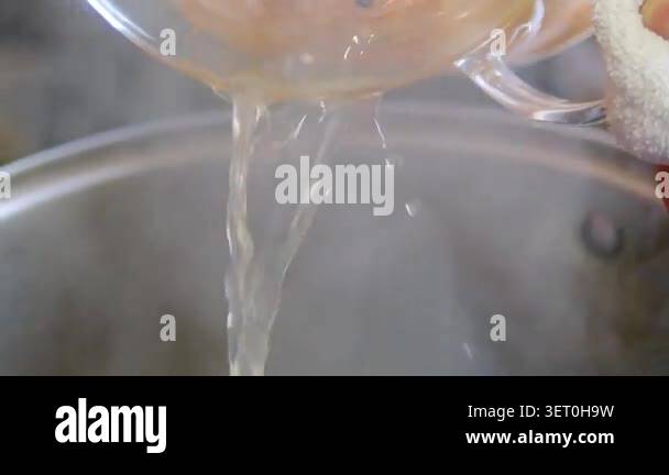 Shrimp are added to boiling water, seasoned with salt and cooked until ...